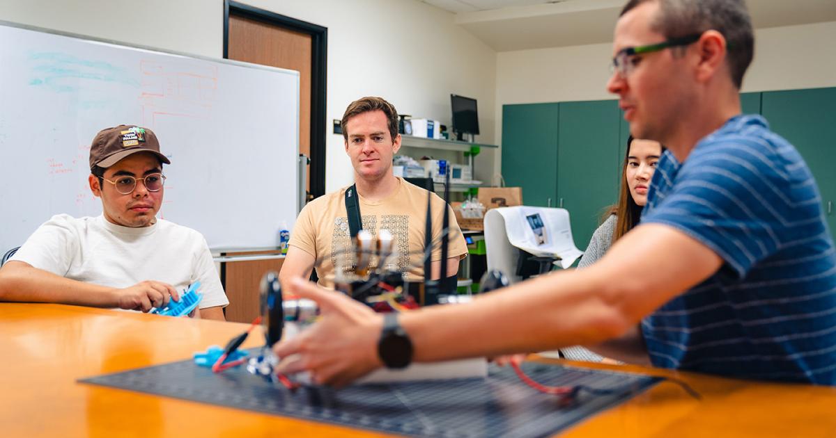 Computer Science Students Work on Autonomous Robots in Campus Lab ...